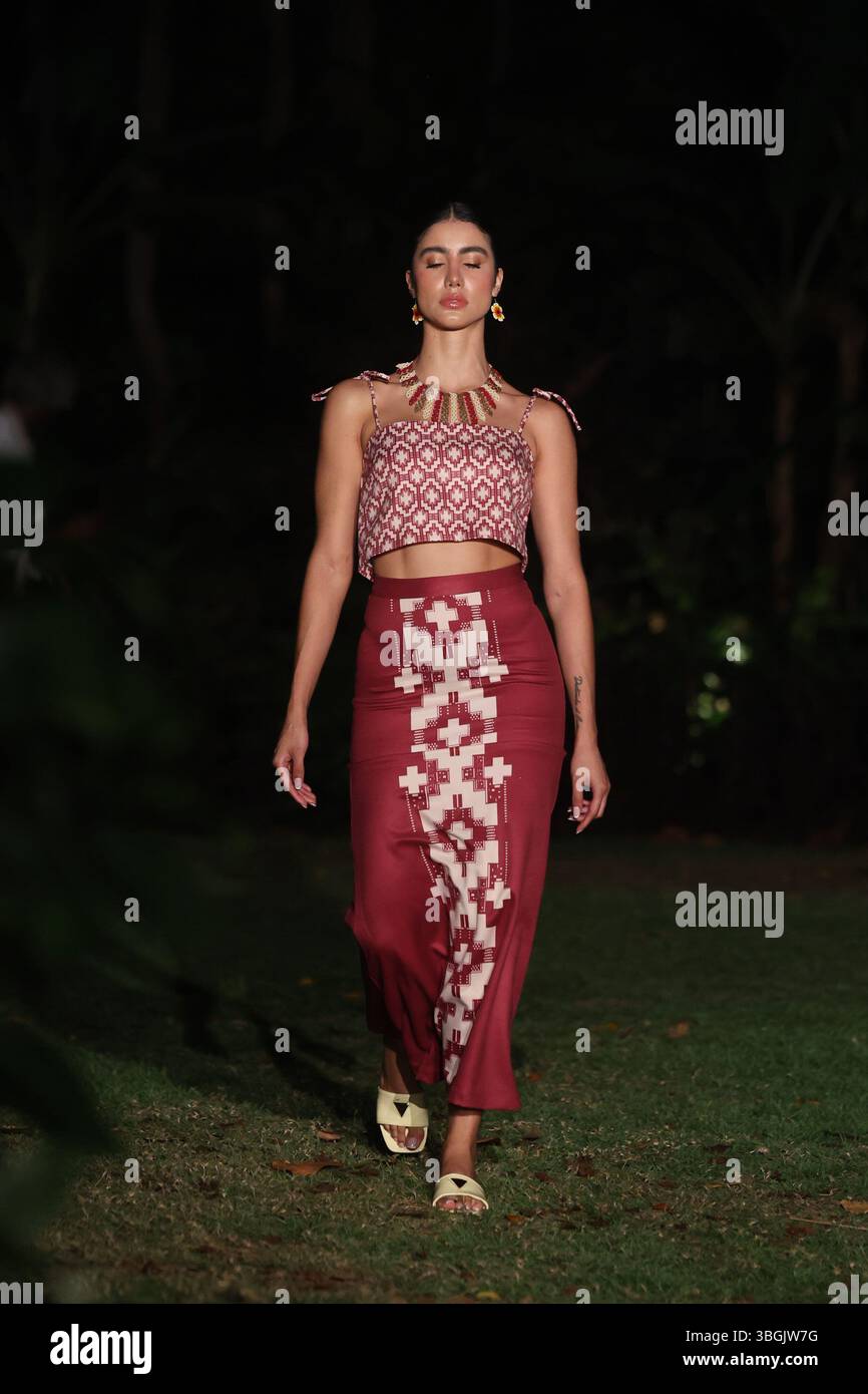MIAMI BEACH, FLORIDA - JUNE 01: Model walks the runway at the Kene Kaya ...