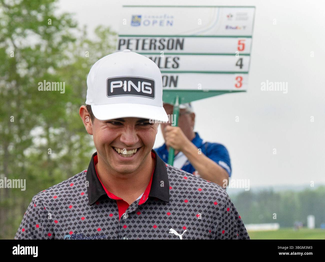 Hunter Thomson smiles as he walks off the course following the first ...
