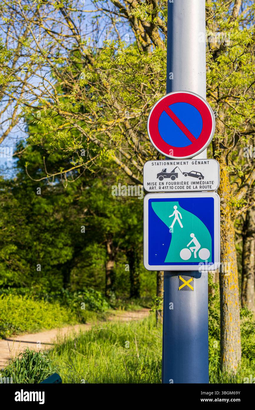 No stopping and no parking sign in a french street. Shared lane for ...