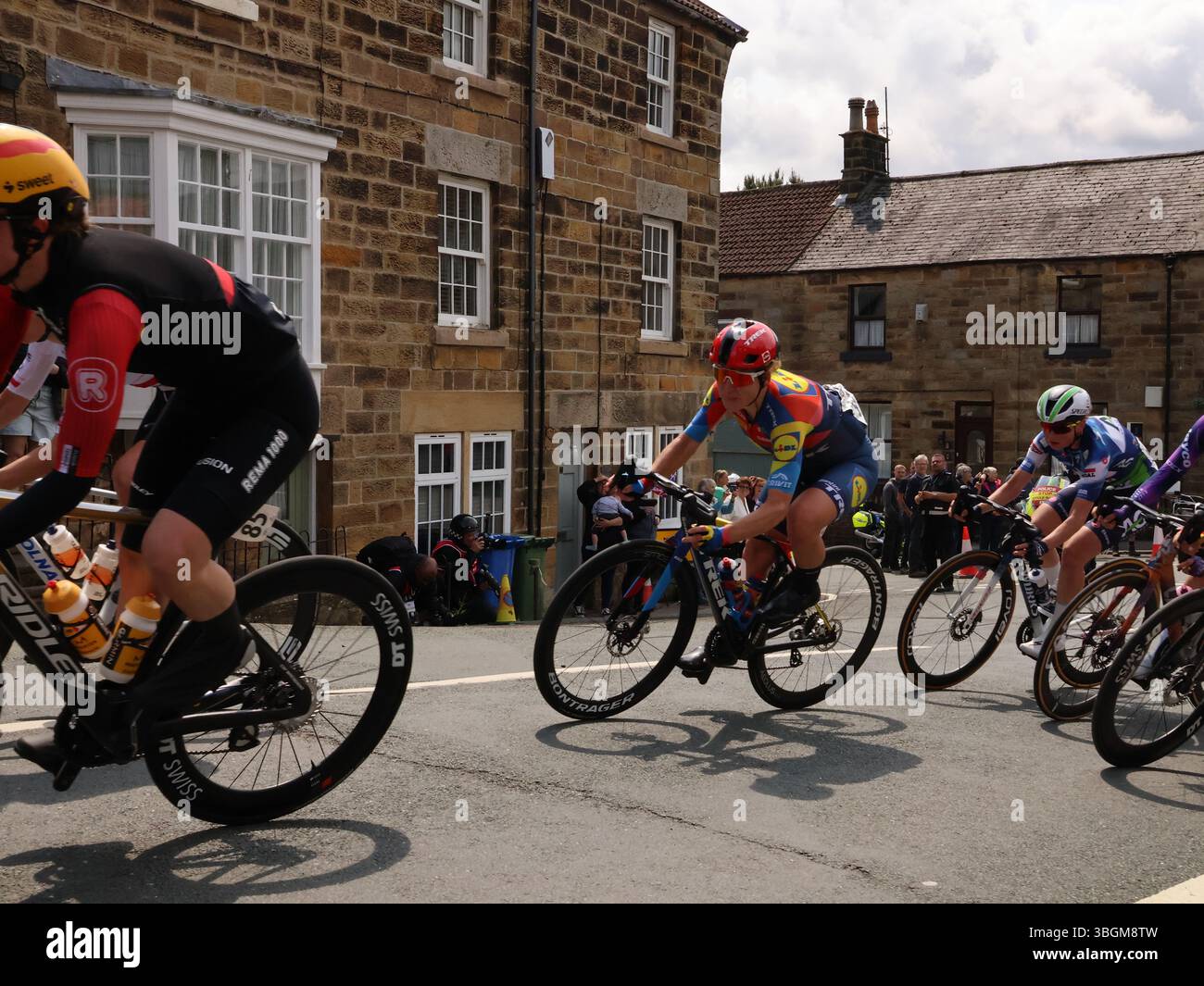 Riders in the peloton compete during Stage 1 of the 2025 Lloyds Bank ...