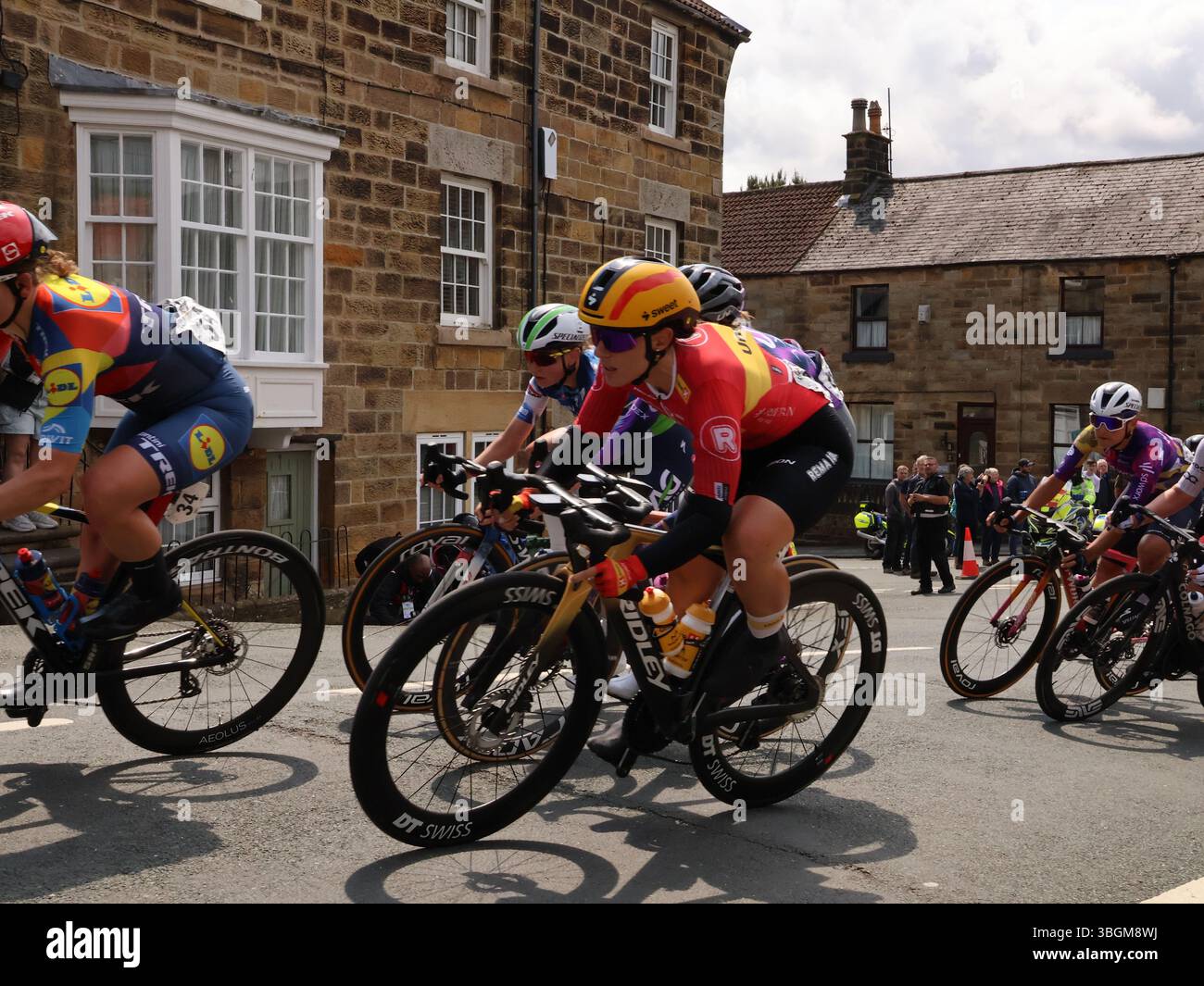 Riders in the peloton compete during Stage 1 of the 2025 Lloyds Bank ...