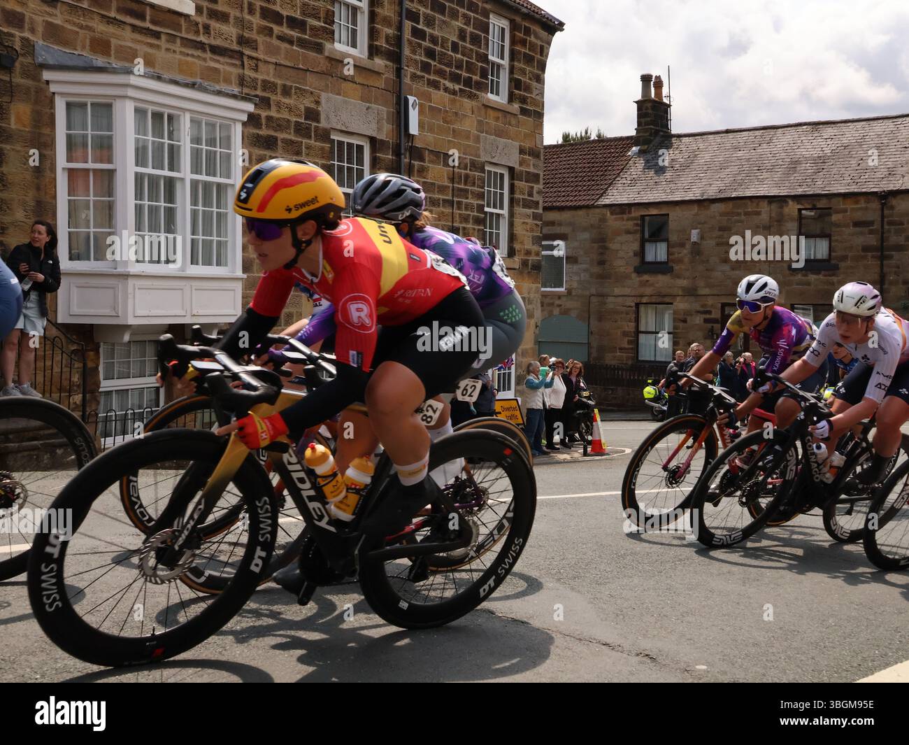Riders in the peloton compete during Stage 1 of the 2025 Lloyds Bank ...