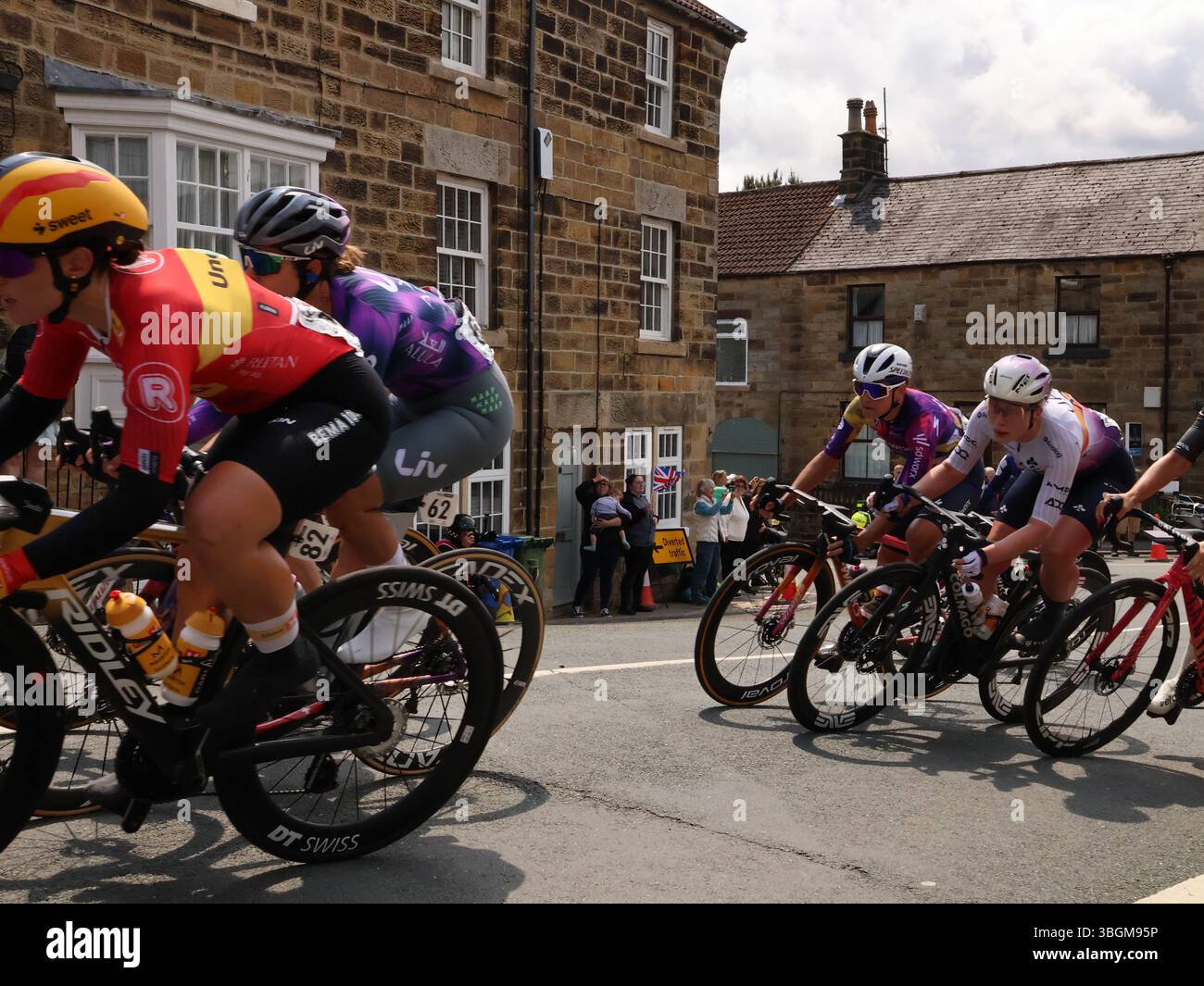 Riders in the peloton compete during Stage 1 of the 2025 Lloyds Bank ...