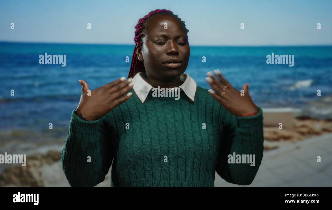 Woman fanning herself hands standing hi-res stock photography and ...