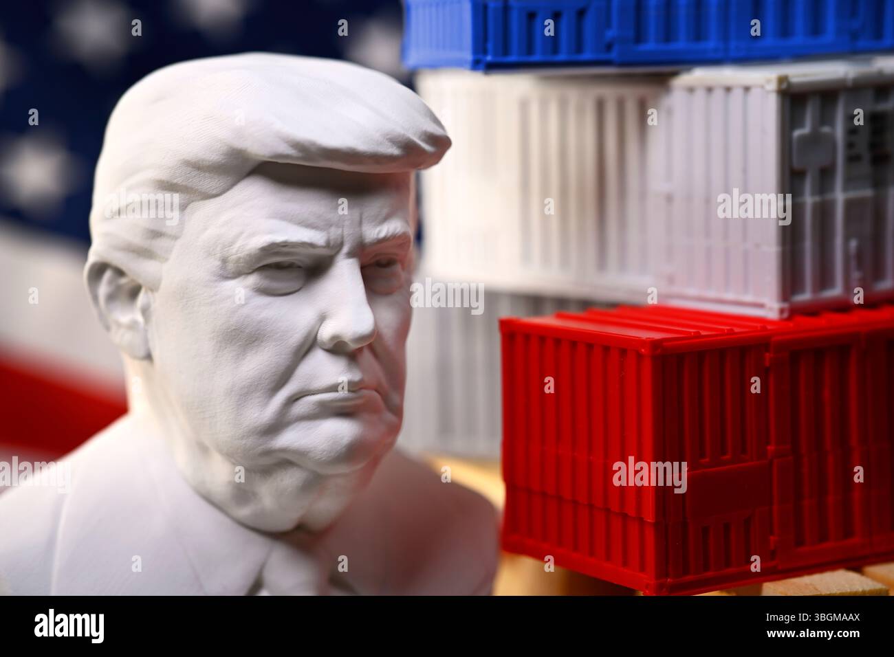 Bust of US President Donald Trump in front of stacked containers, trade ...