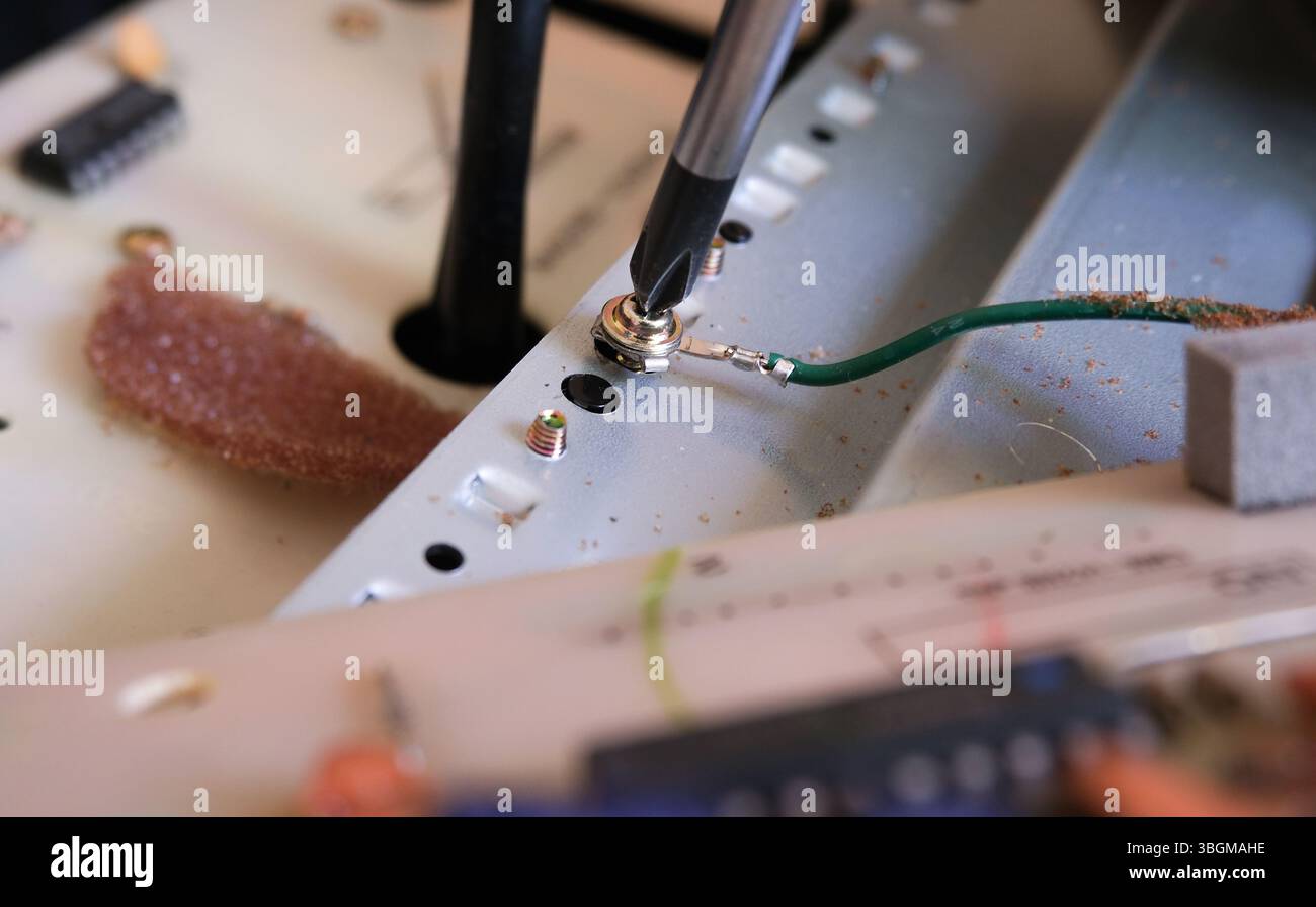 Grounding wire installation in electronic device Stock Photo - Alamy