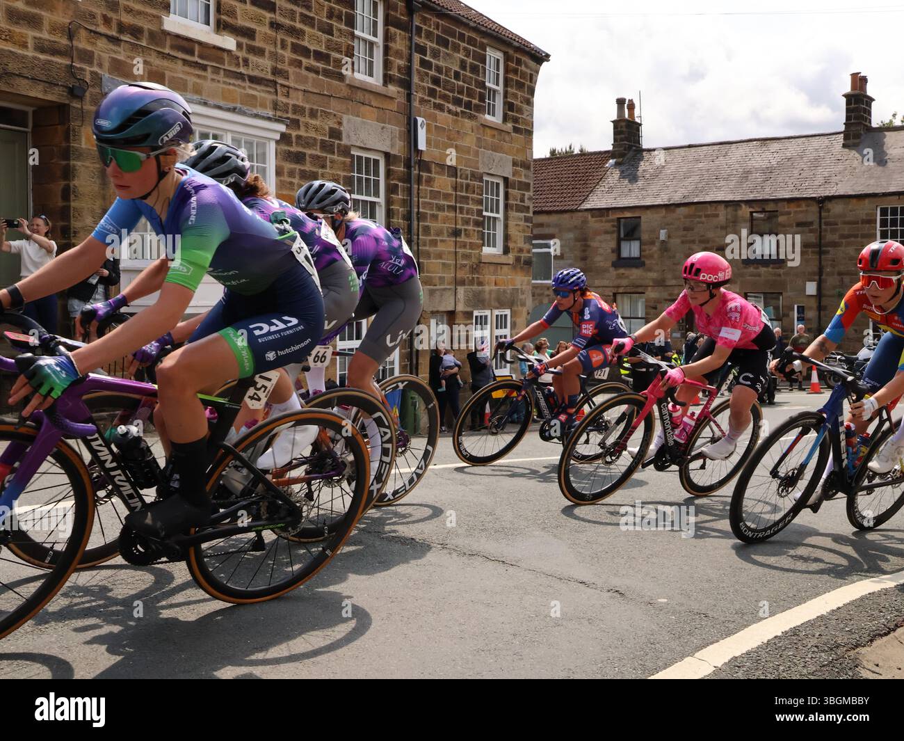 Riders in the peloton compete during Stage 1 of the 2025 Lloyds Bank ...