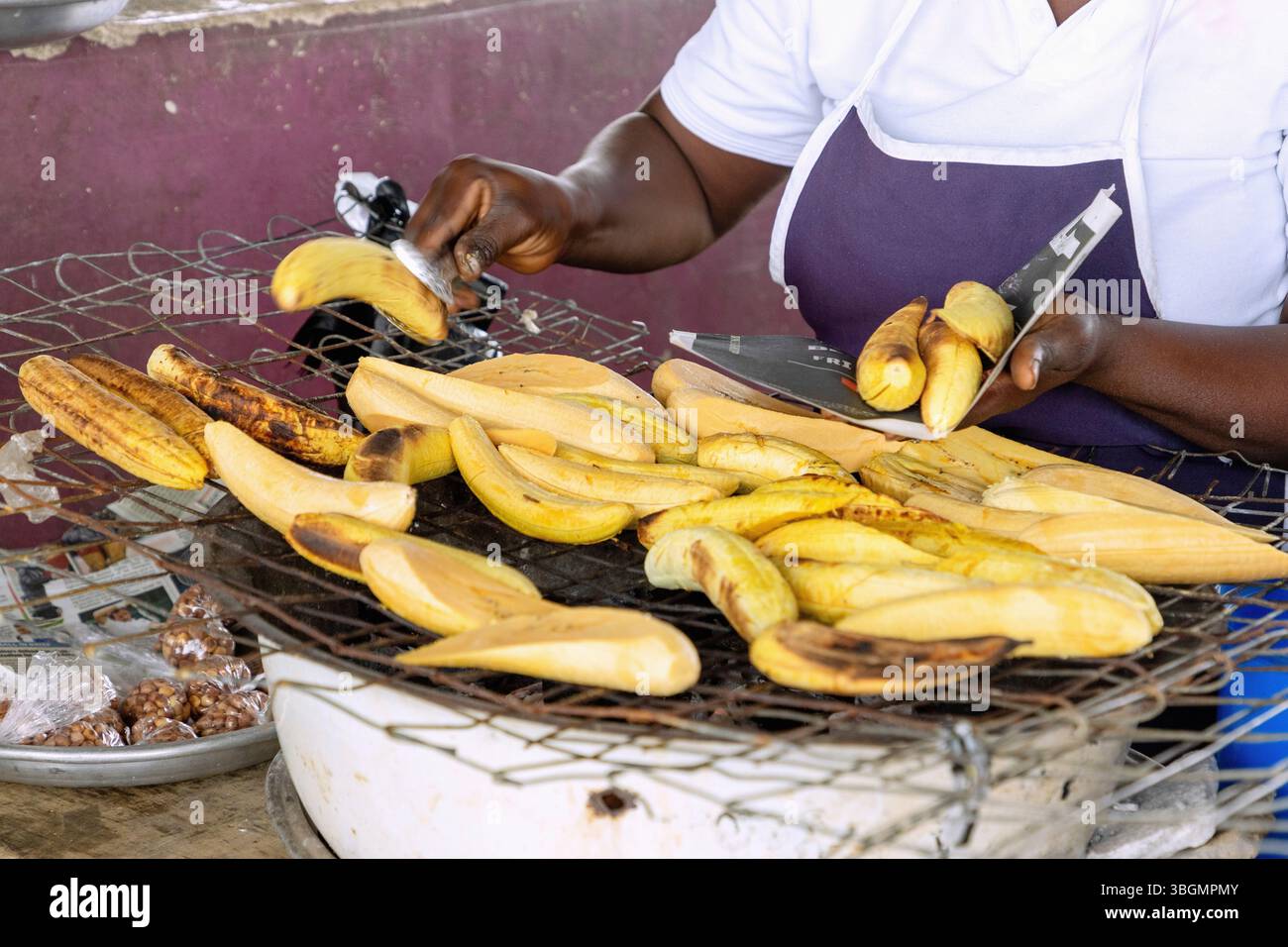 Roadside cookshop with grilled plantains in Ayinam in the Eastern ...