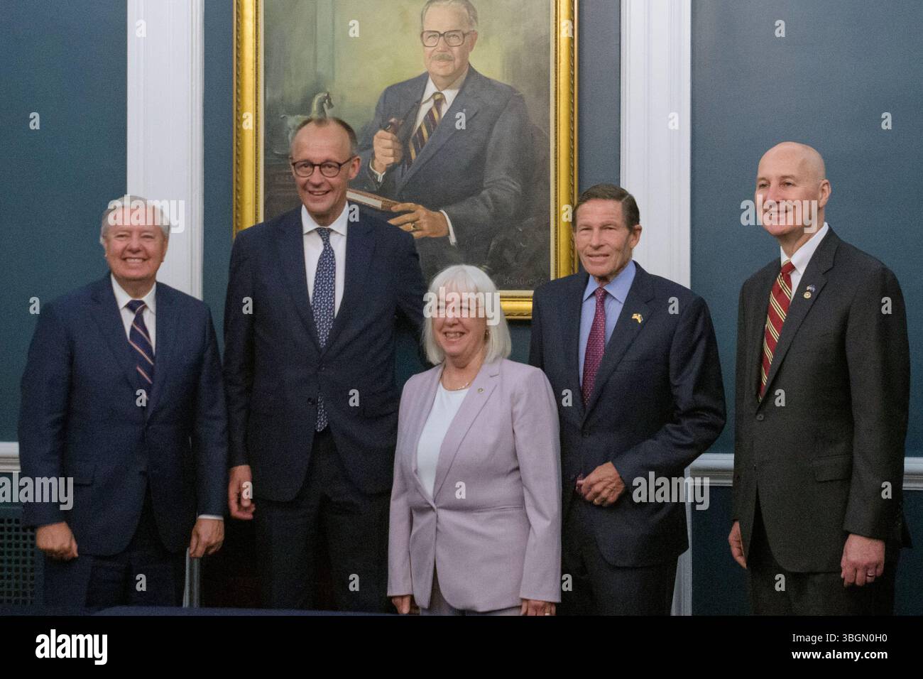 German Chancellor Friedrich Merz, second from left, poses with, from ...