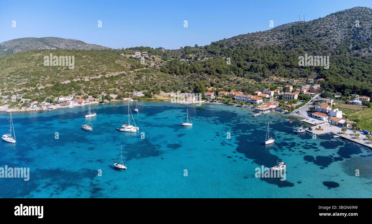 Aerial view of the fishing village of Posidonio with a view of Mount Chrondo Vouno in the east ...