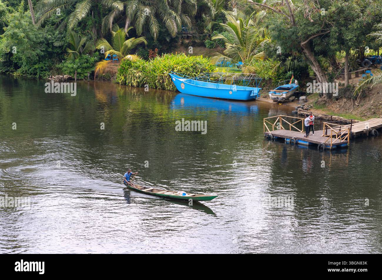 Fishermen in a pirogue boat on the Volta River, view from the Volta ...