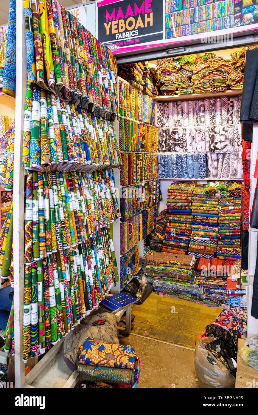 traditional wax batik fabrics in the central market in Kumasi in the ...