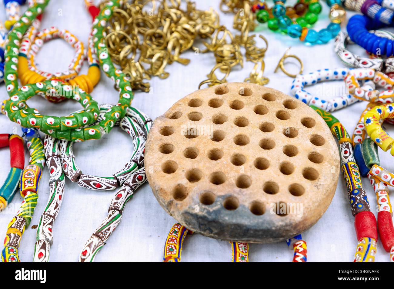 Hand-painted glass bead jewelry, Ashanti gold rings and clay model for ...