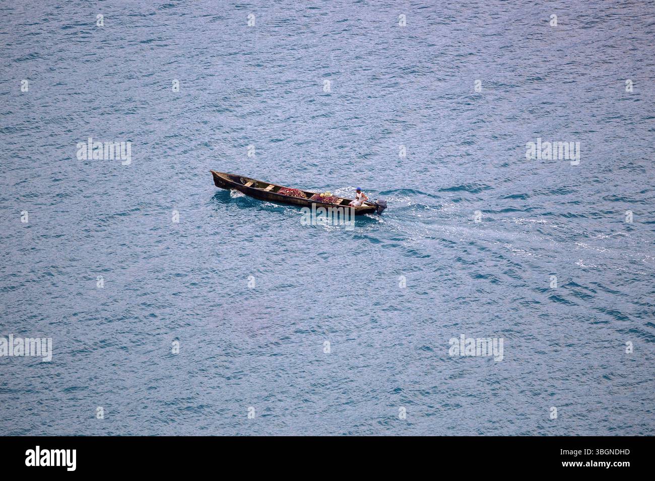 Fisherman with pirogue boat off the island of Principe in West Africa ...
