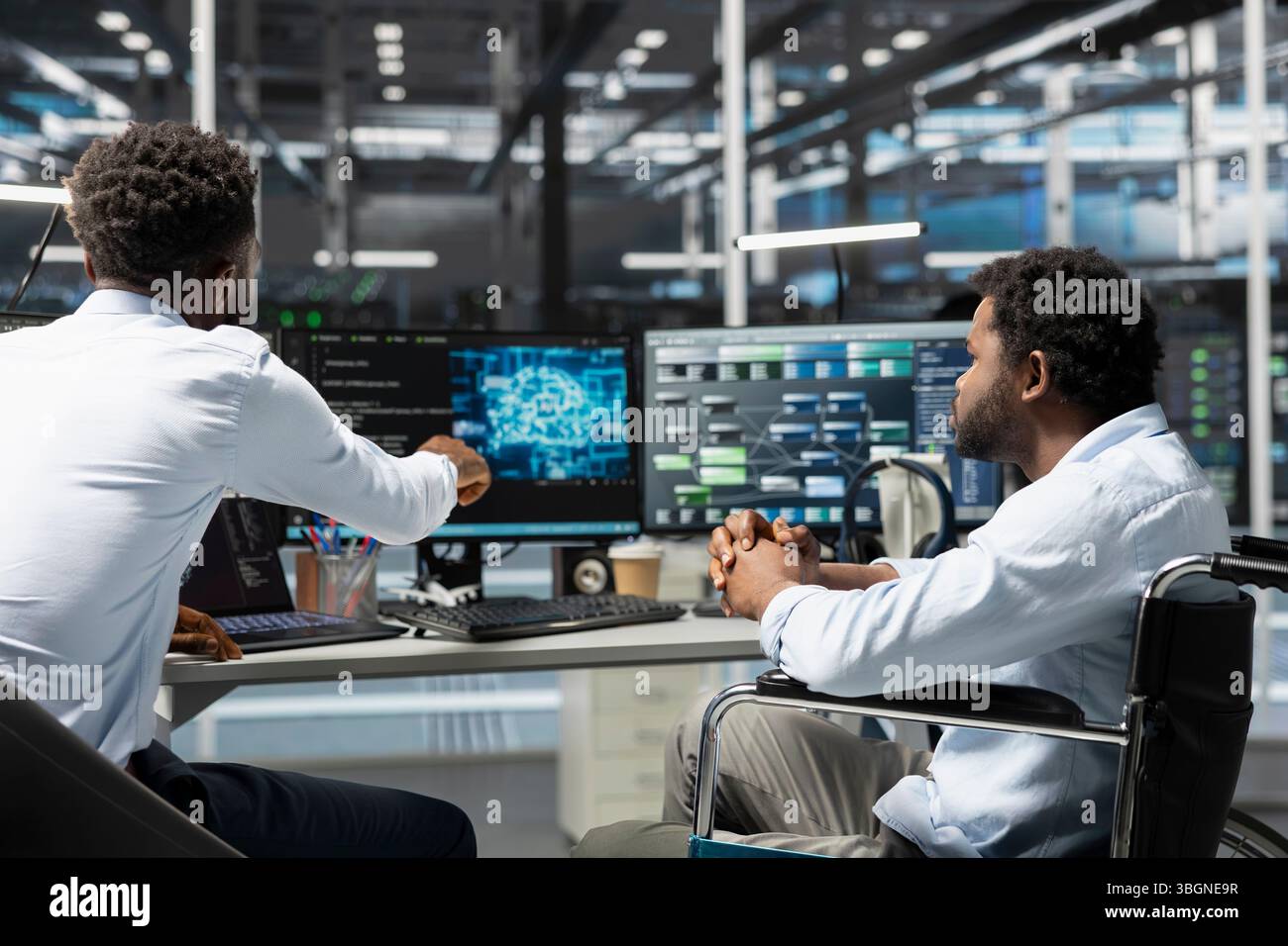 Server room manager and employee in wheelchair use artificial ...