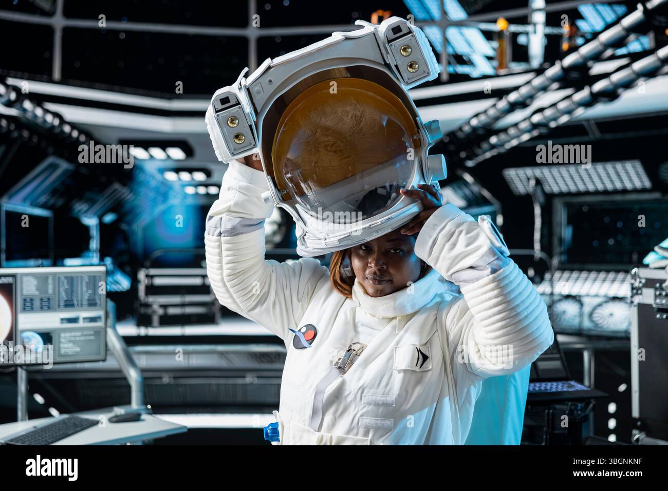 Portrait of female cosmonaut putting on cosmic gear helmet, preparing ...