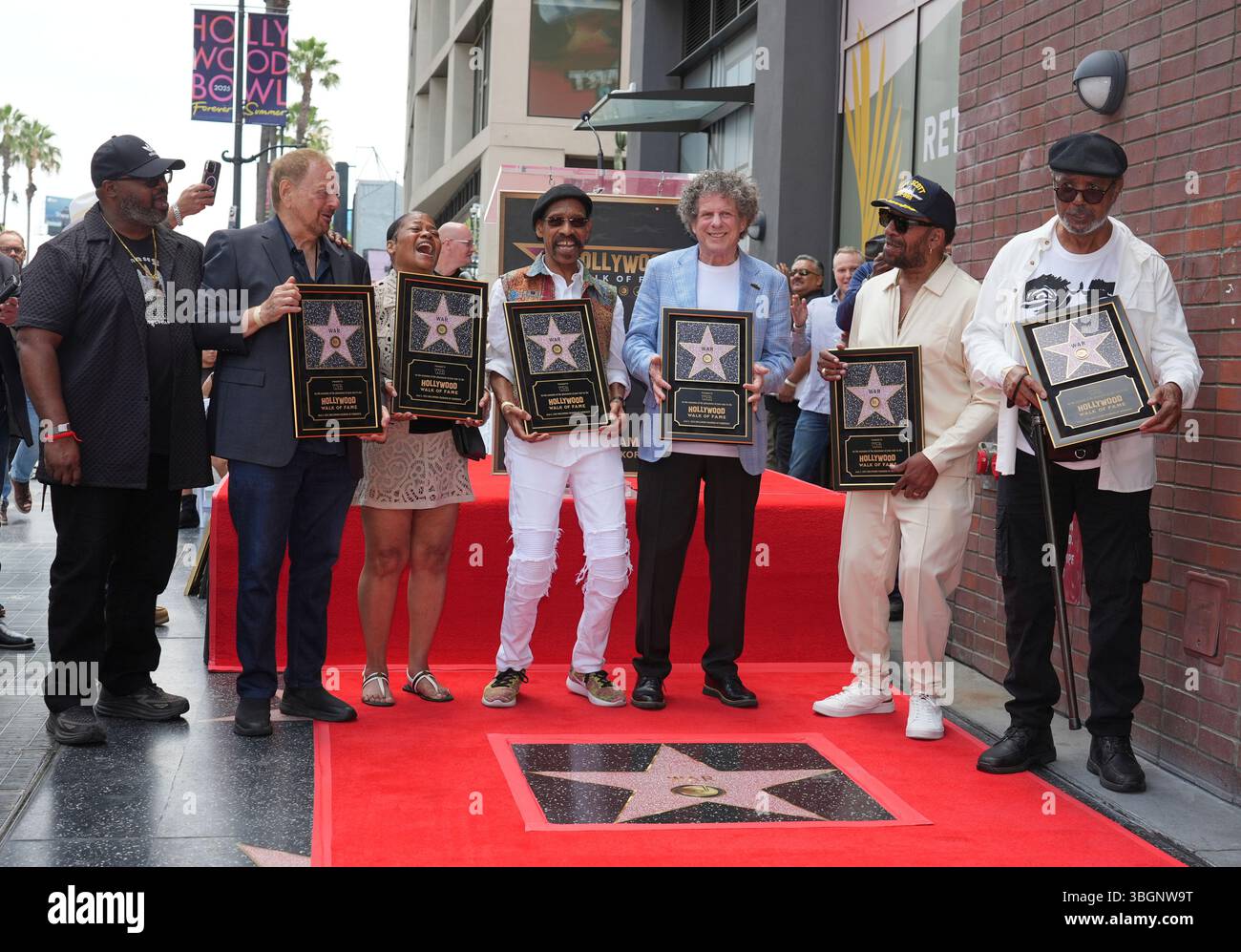 WAR band members Lonnie Jordan, fourth from right, Lee Oskar, third ...
