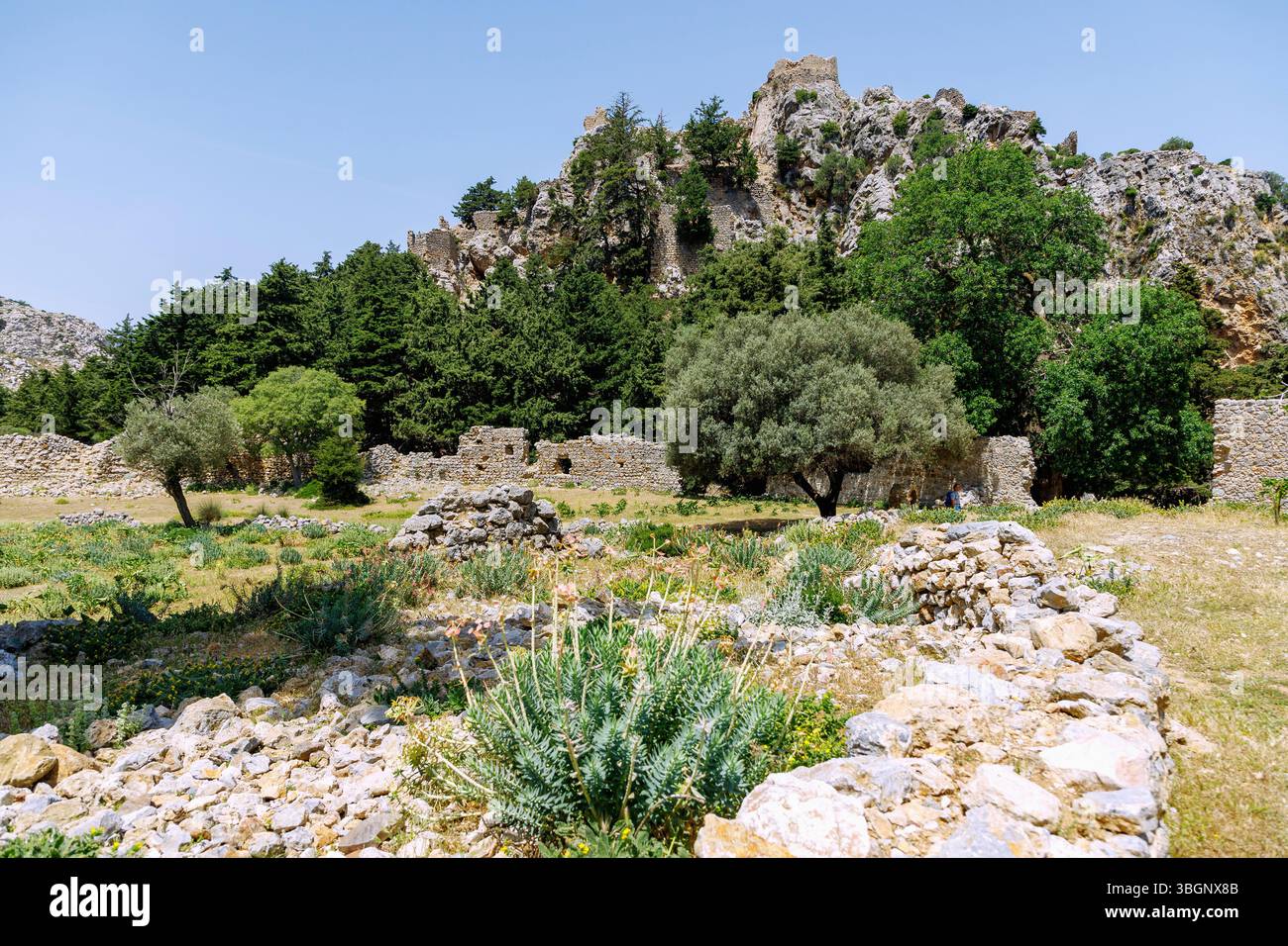 Remains of the town fortifications and view of the castle ruins of Castro in the ruined town of ...