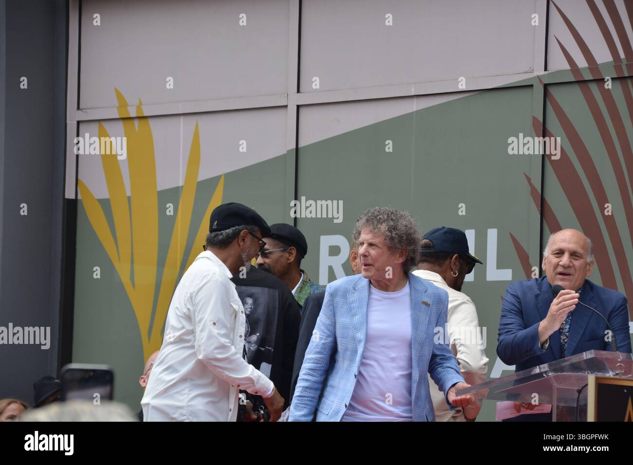 WAR band members Harold Brown and Lee Oskar with Steven Nissen during ...