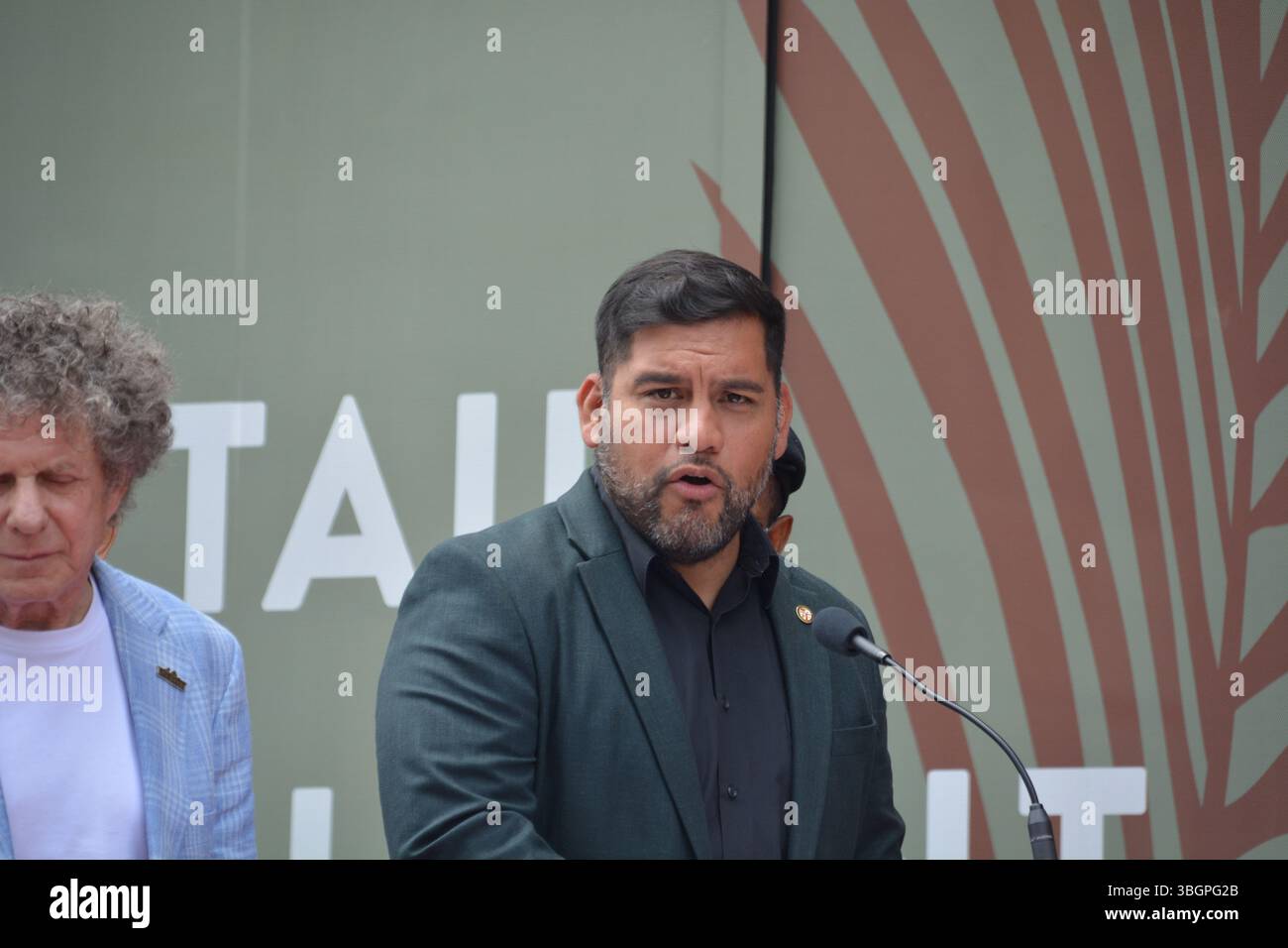 WAR harmonica player Lee Oskar with Councilmember Hugo Soto-Martinez at ...