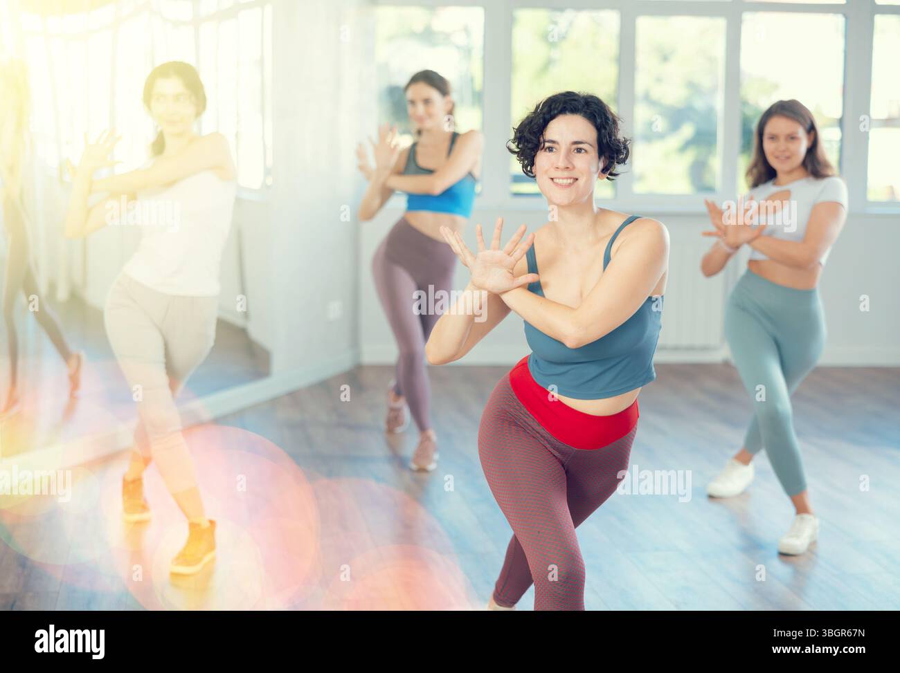 Female teacher conducts modern dance lessons for group of girls Stock ...