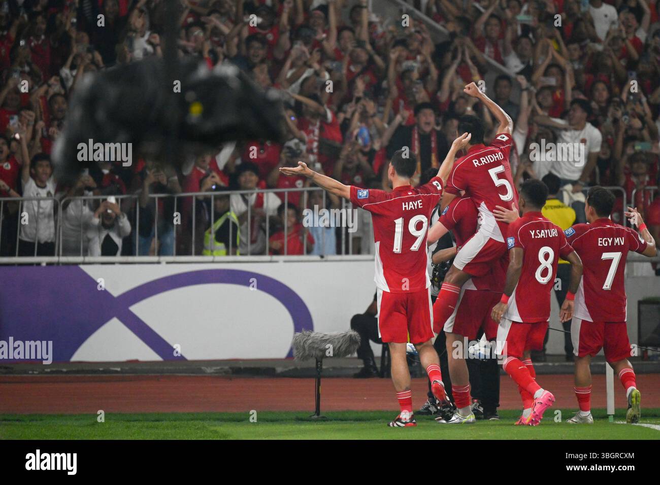 Jakarta, Indonesia. 5th June, 2025. Players of Indonesia celebrate ...