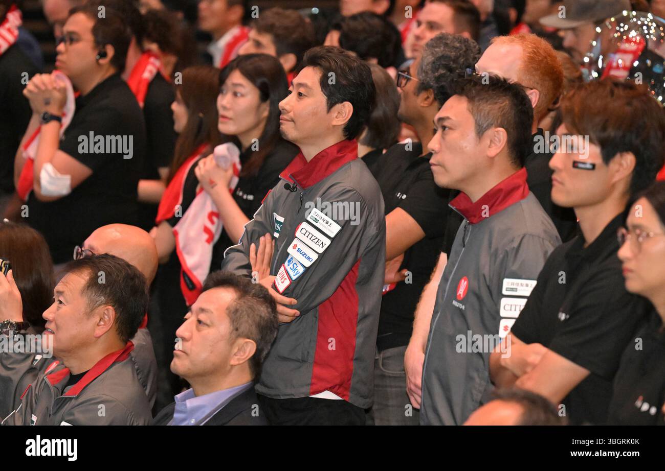 Takeshi Hakamada (center left), CEO of ispace, participates in a ...