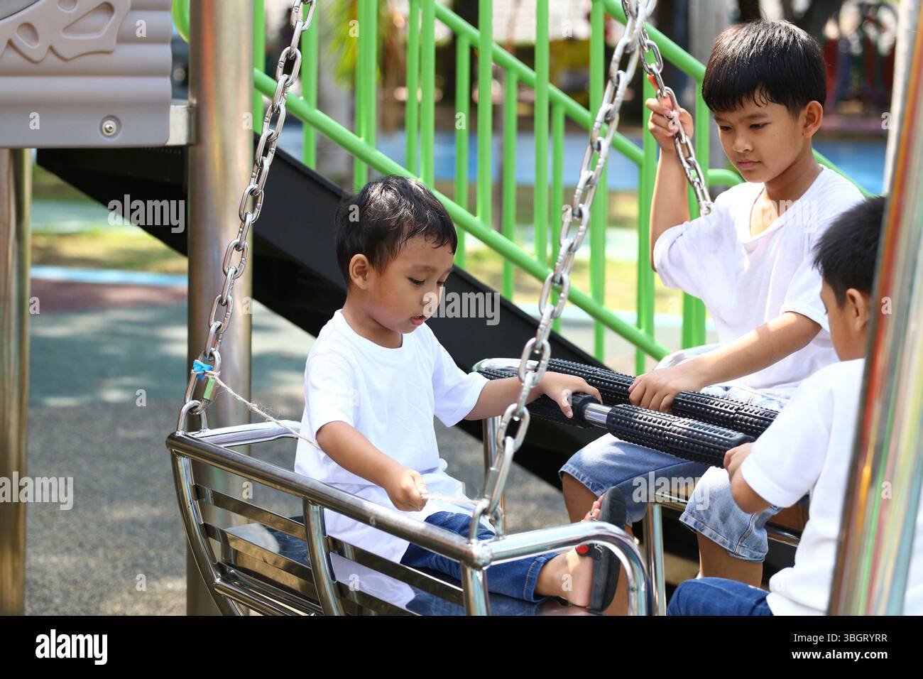 A vibrant playground scene featuring joyful children engaged in play ...