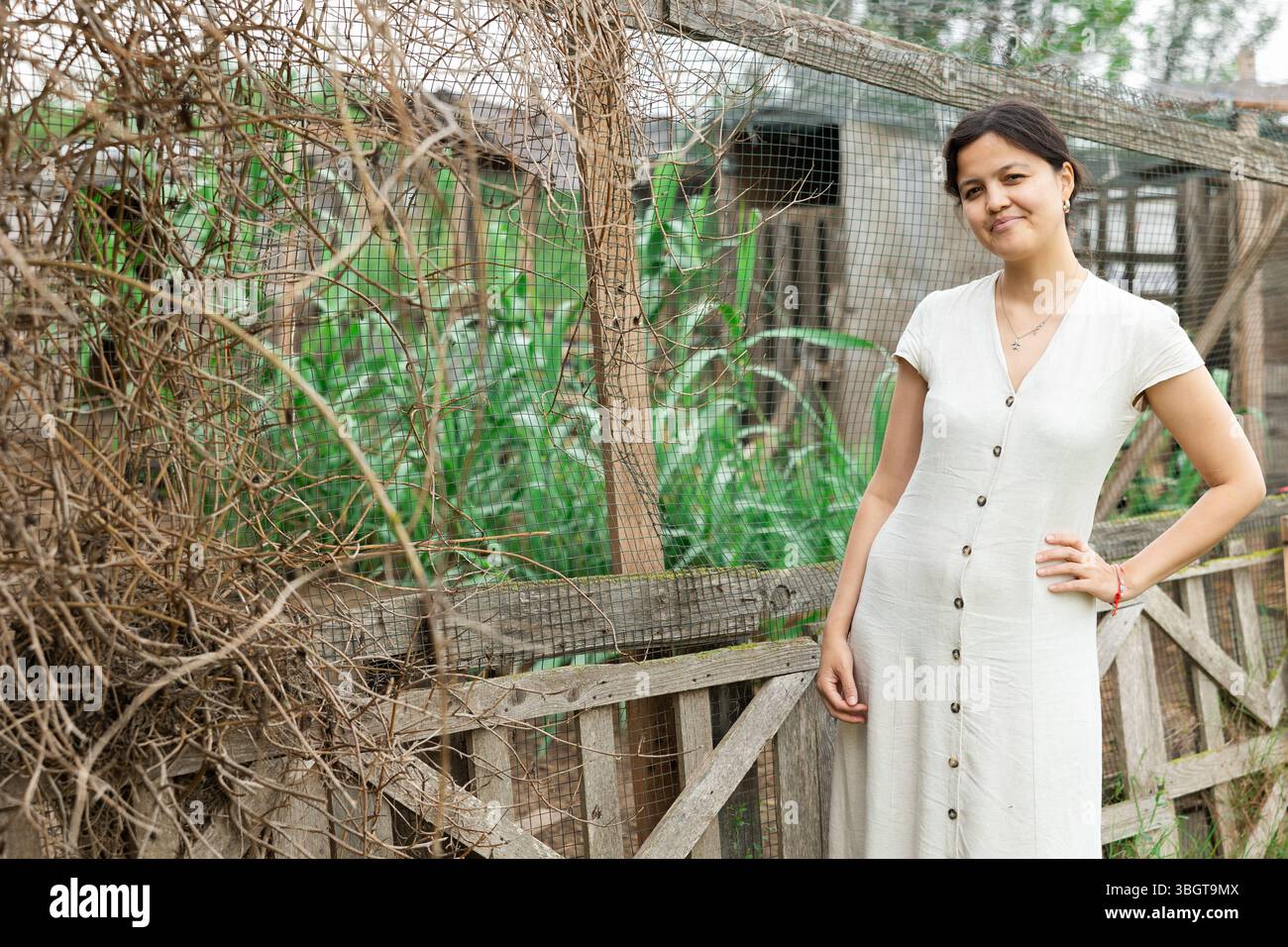 Asian woman at farm Stock Photo - Alamy