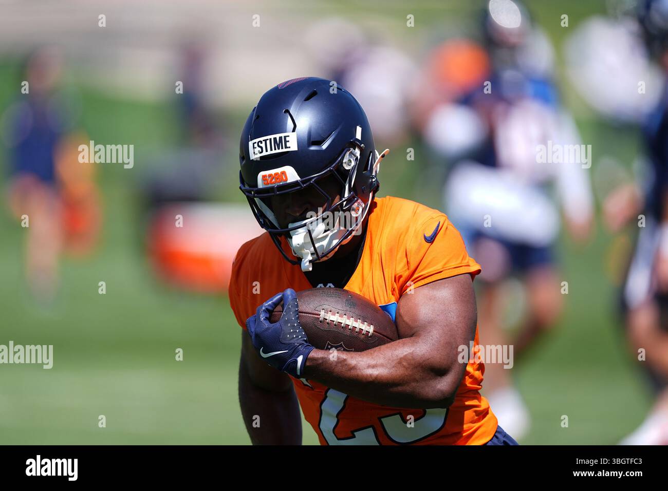 Denver Broncos running back Audric Estime (23) takes part in drills during an NFL football team ...