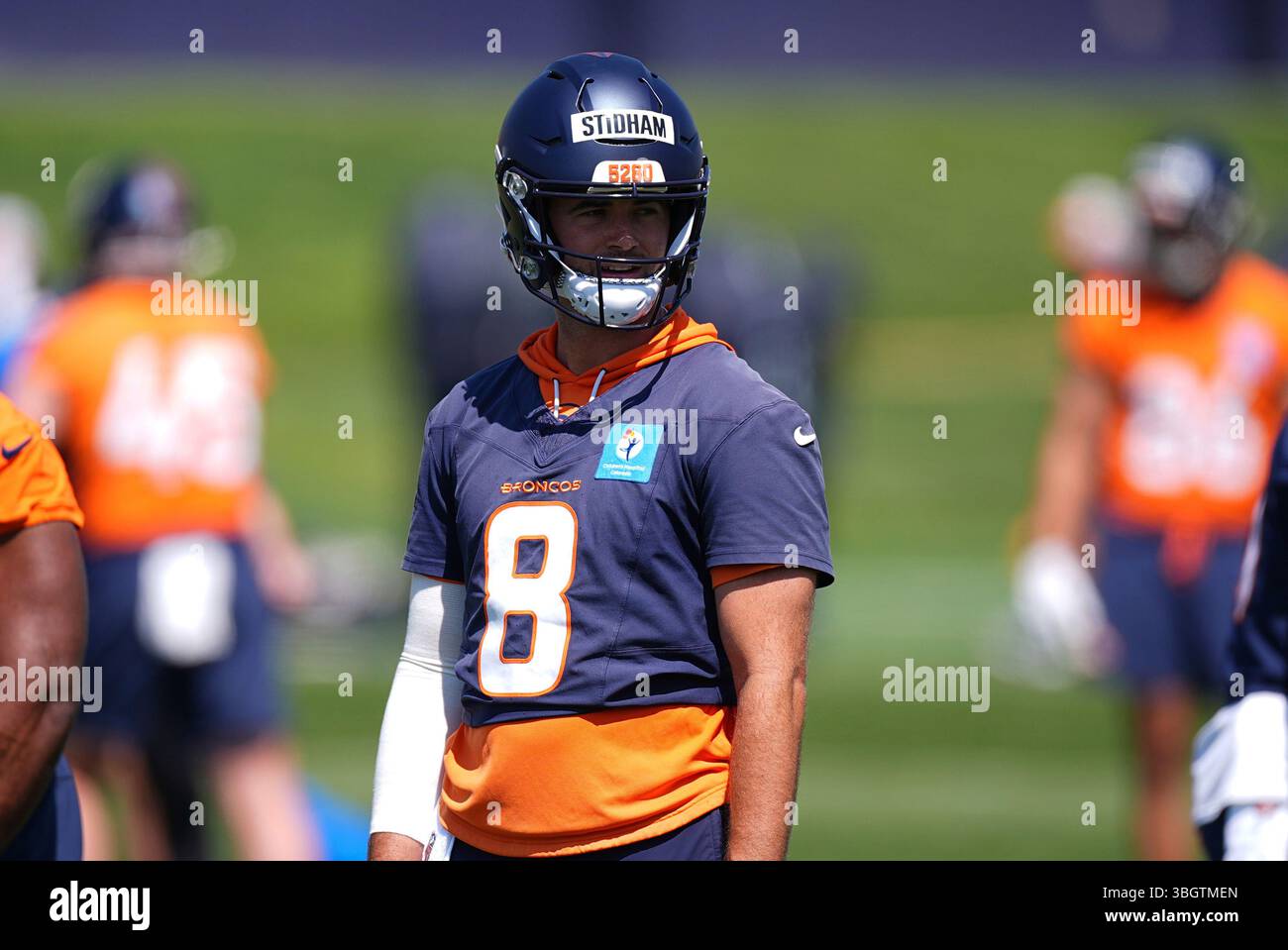 Denver Broncos quarterback Jarrett Stidham (8) takes part in drills ...