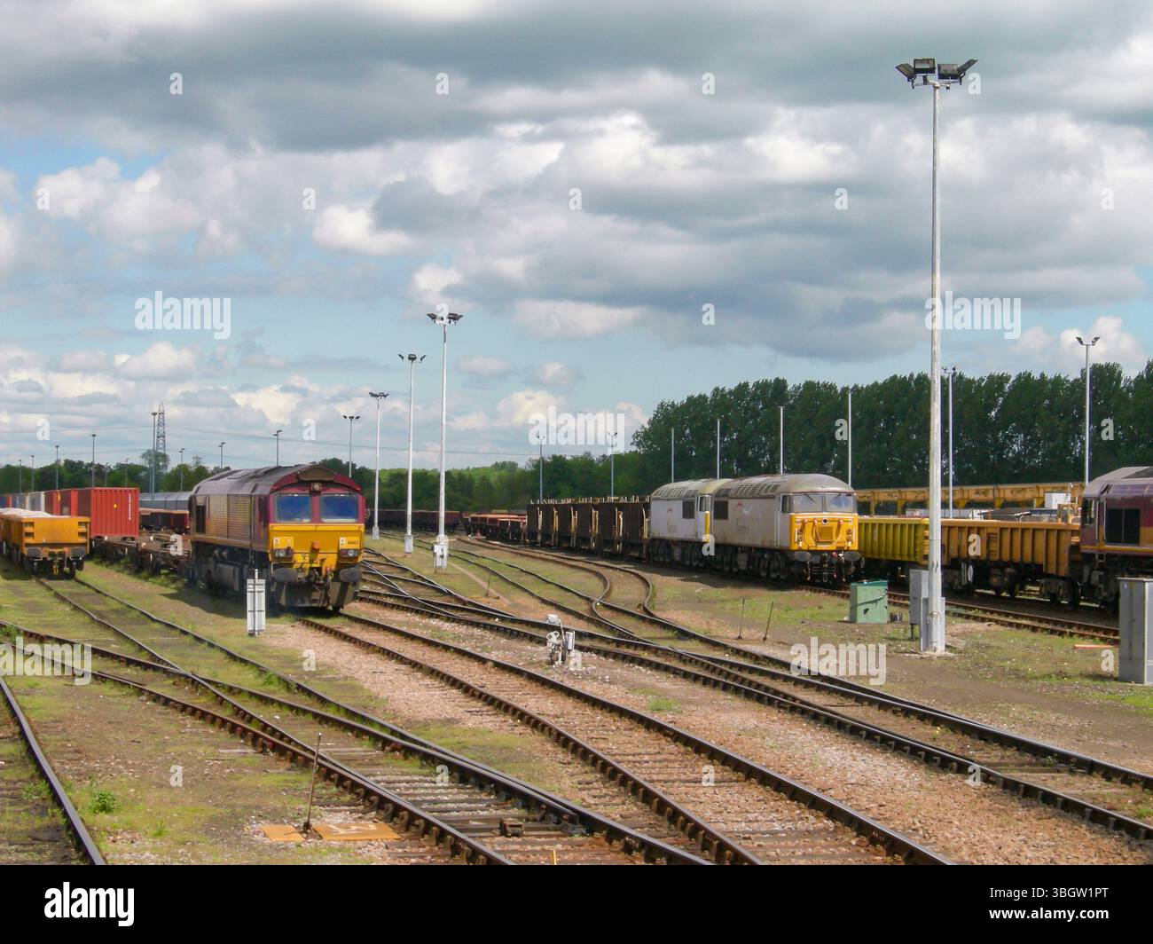 Freight trains in a yard Stock Photo - Alamy