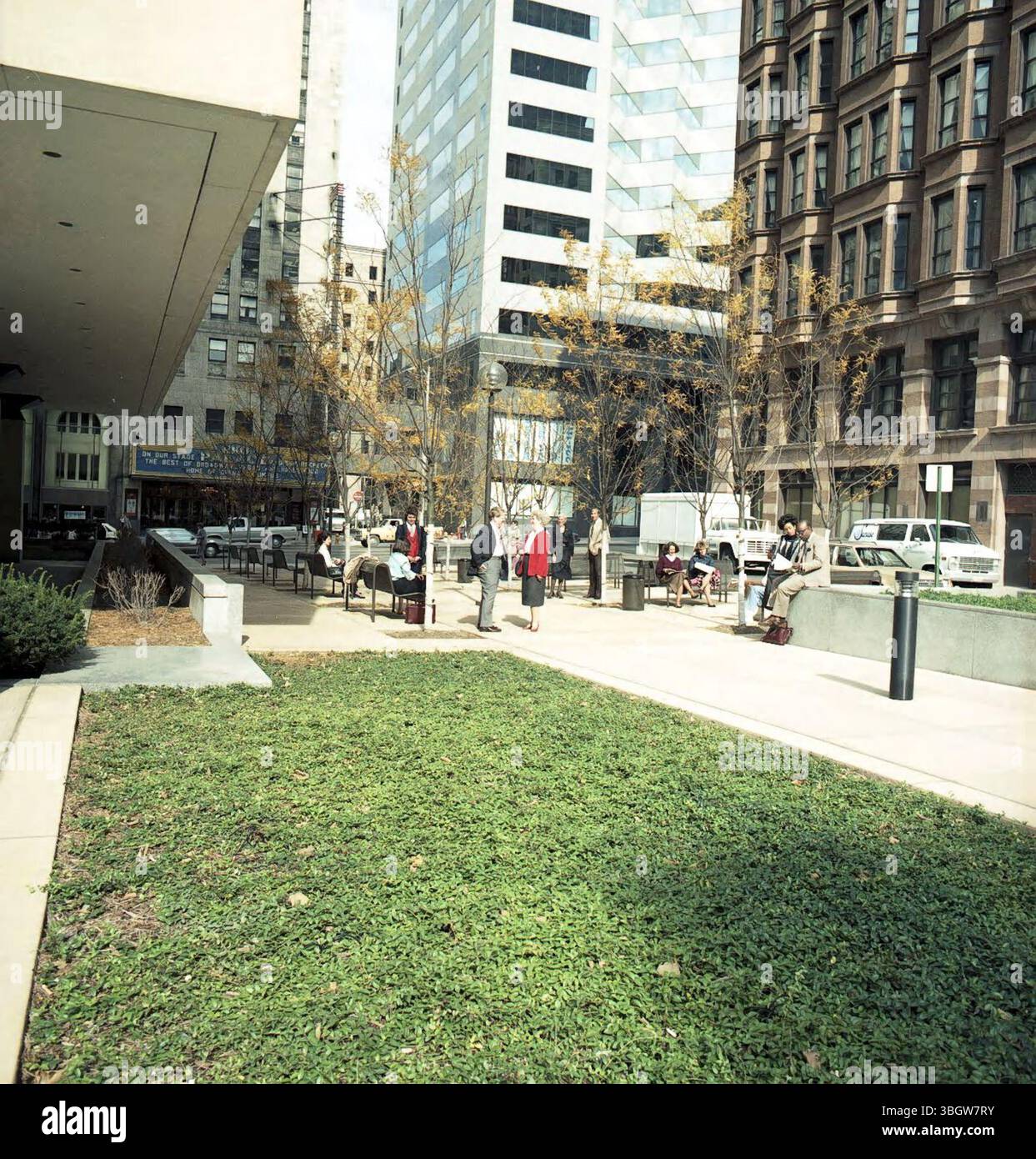 A photograph of Wall Street, depicting its busy commercial activity and ...