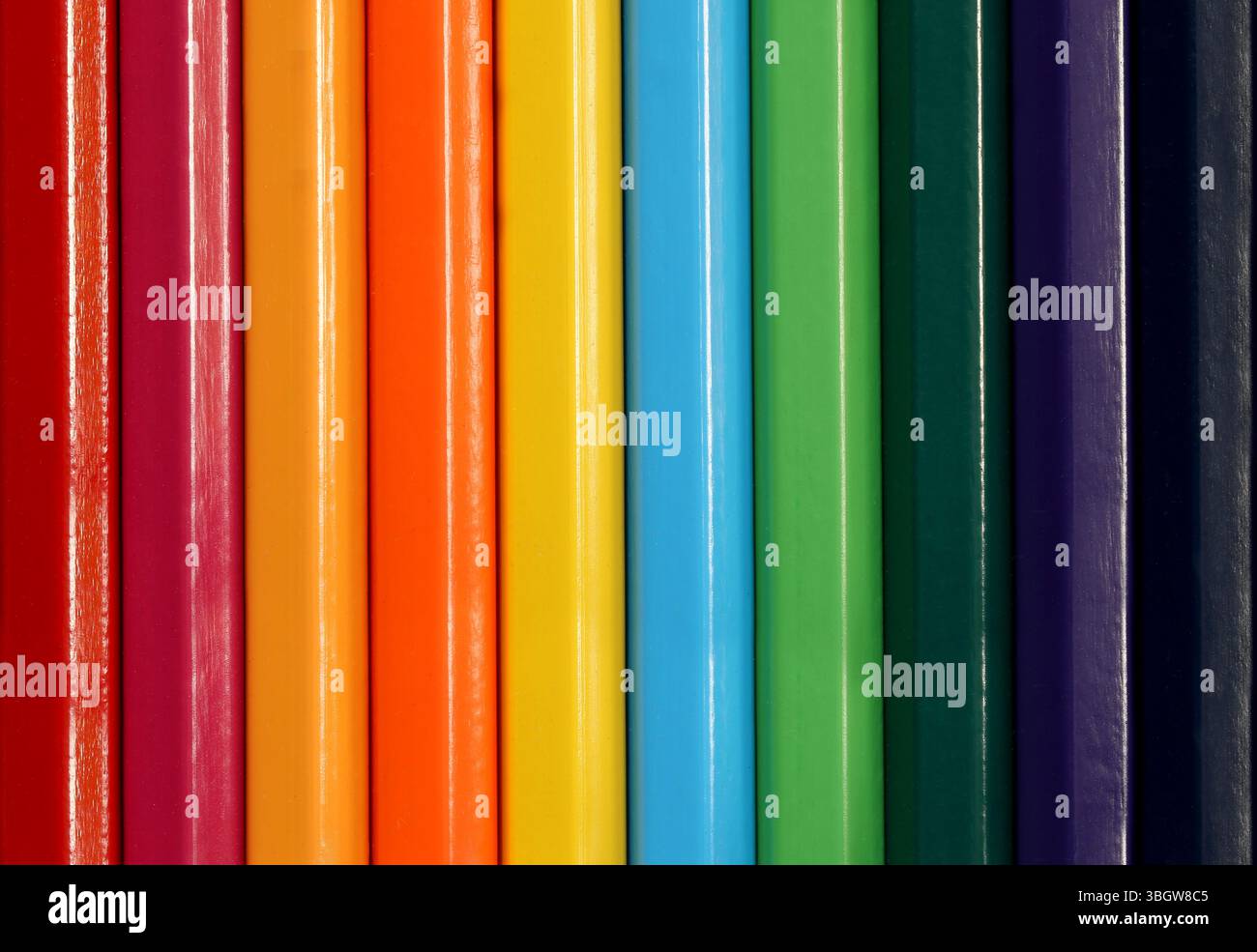 A visually captivating arrangement of colorful book spines in a ...