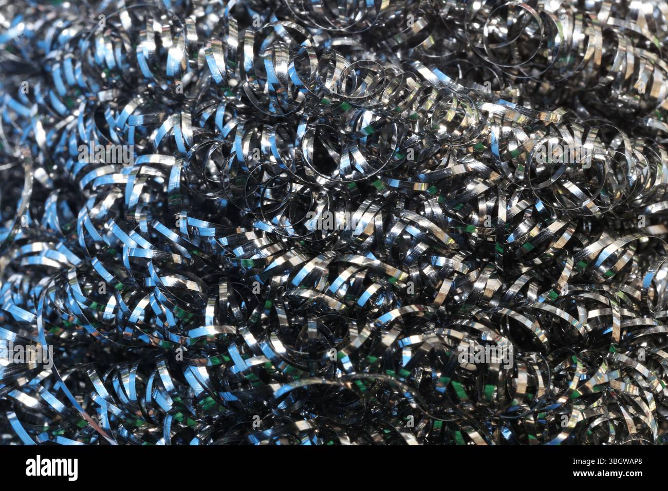 Scrap iron cut from steel bars in lathes background by this steel mill ...