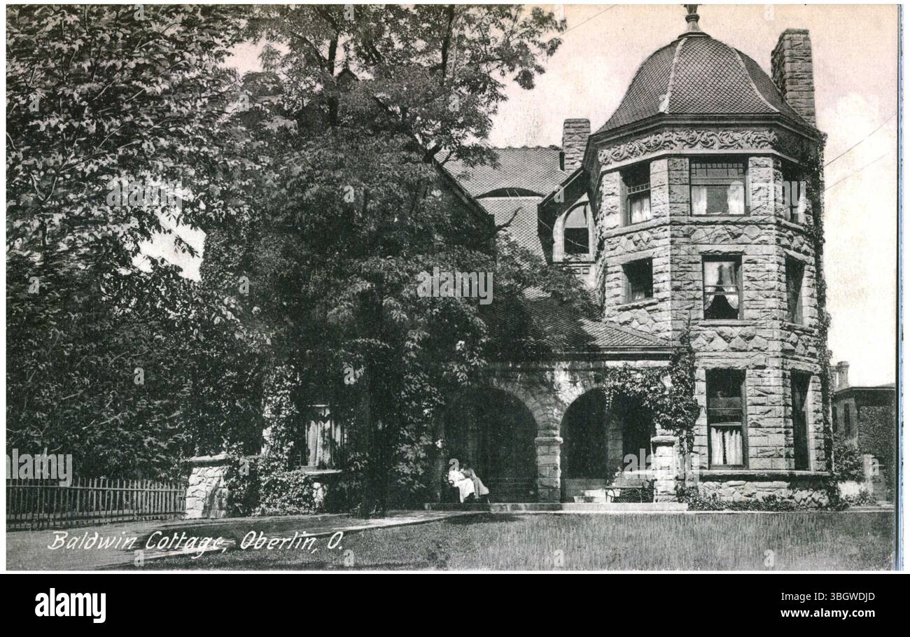 A 1908 black and white photograph of Baldwin Cottage, a large stone ...