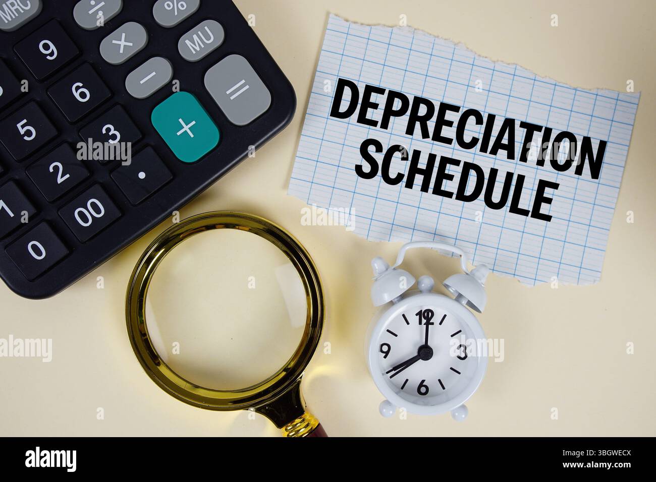 Depreciation Schedule text with alarm clock, magnifying glass anc ...
