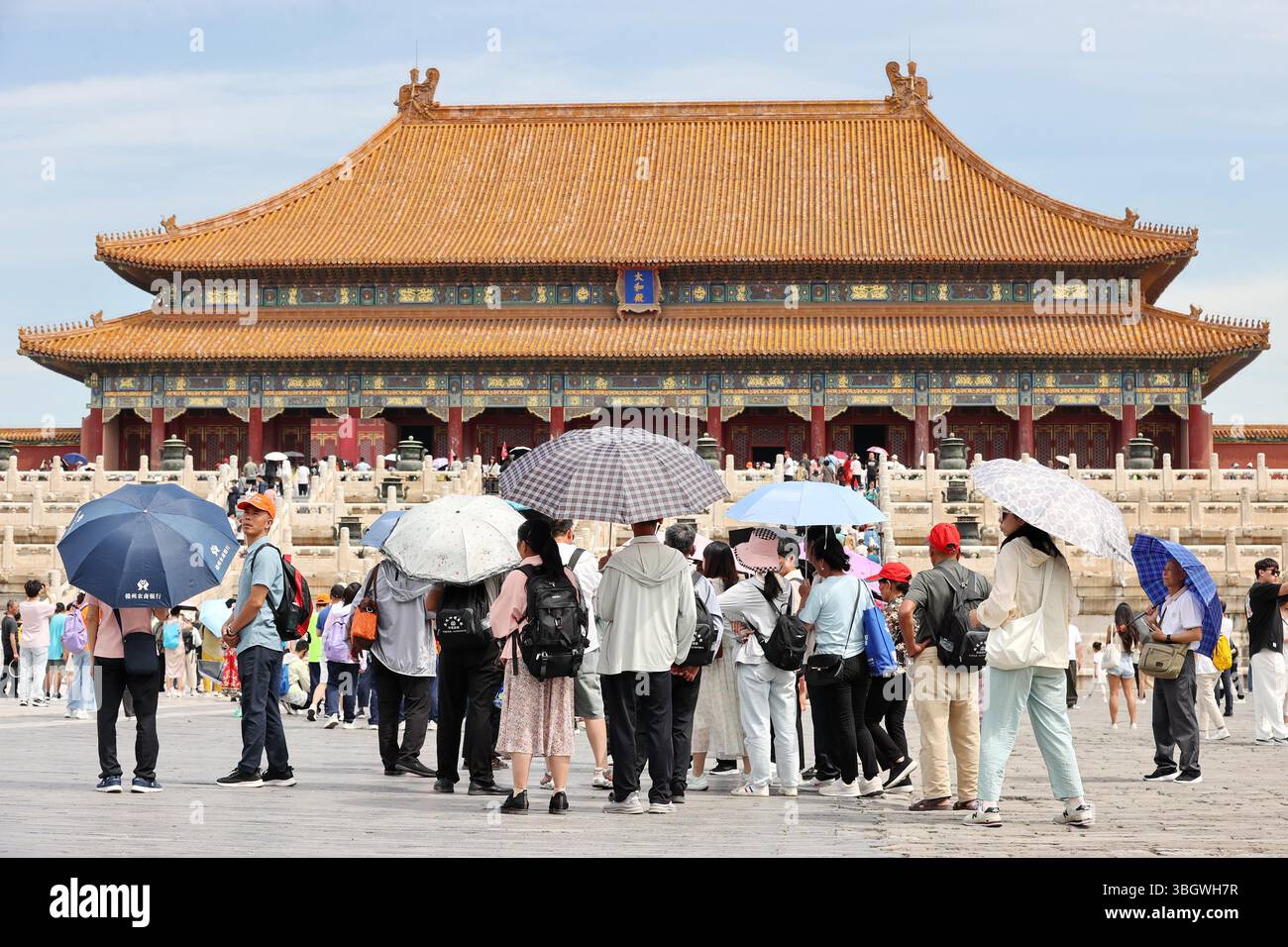 Tourists visit the Palace Museum amid hot weather in Beijing, China, 5 ...