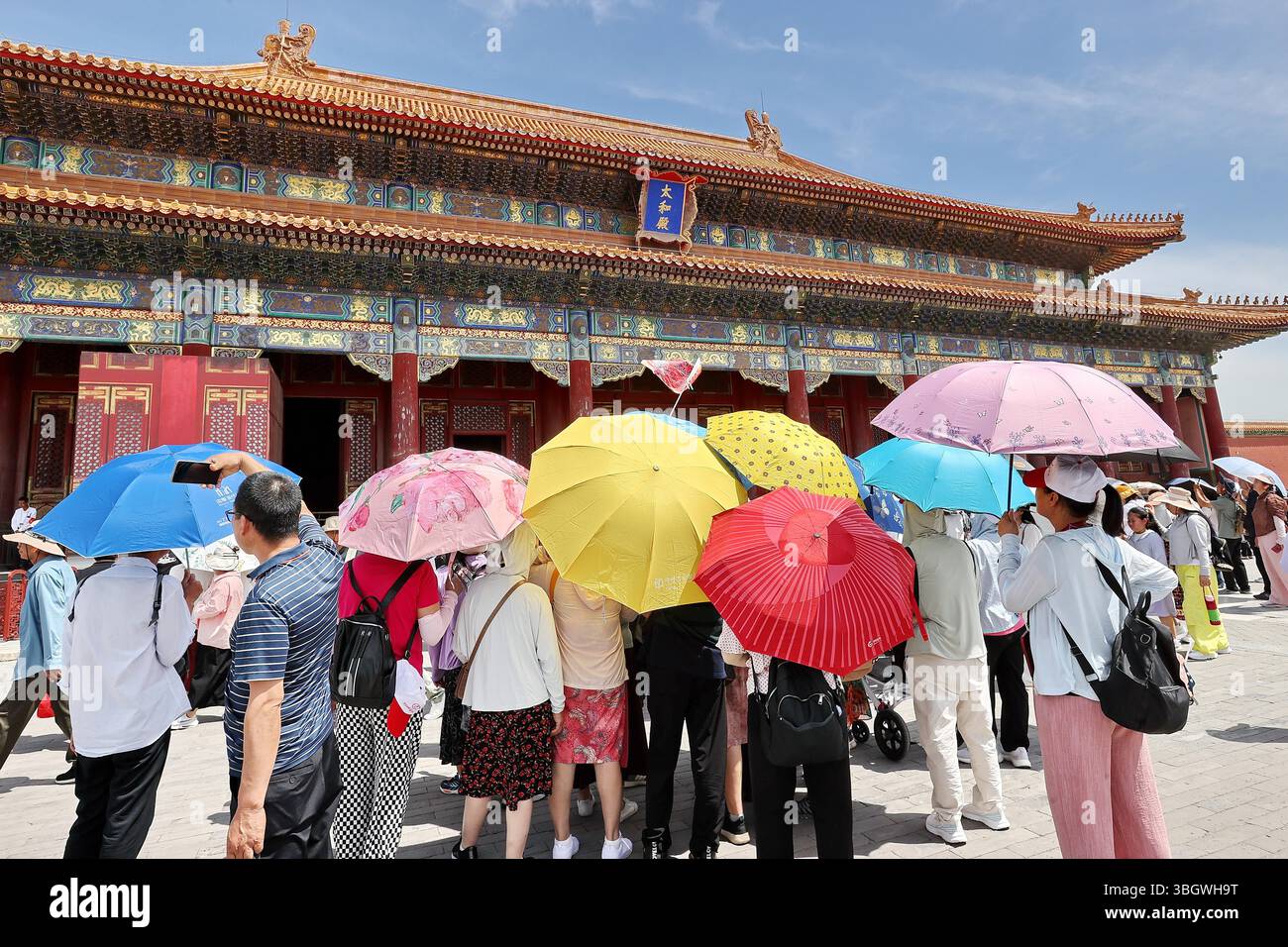 Tourists visit the Palace Museum amid hot weather in Beijing, China, 5 ...
