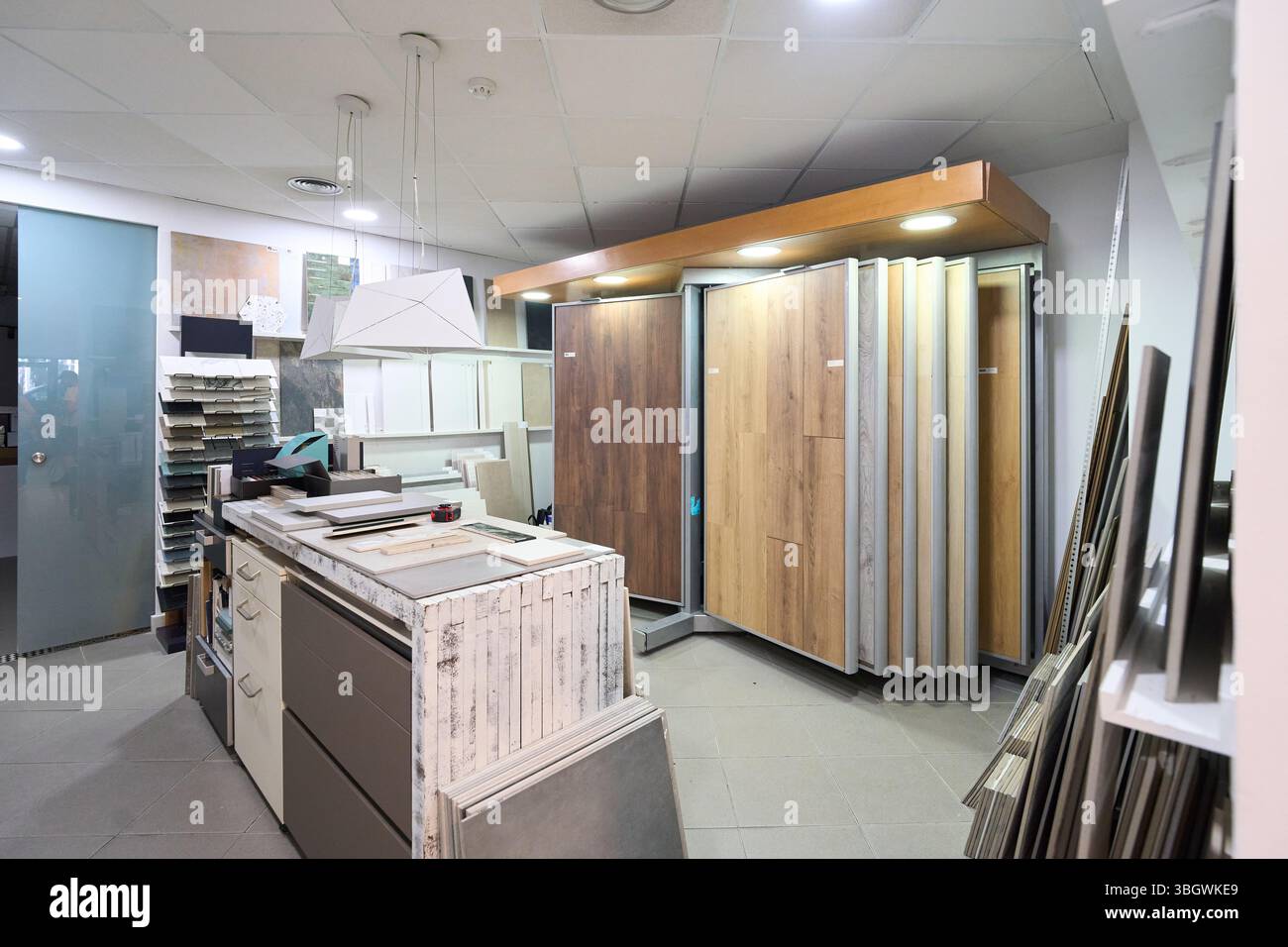 Modern showroom displaying various flooring and tile samples Stock ...