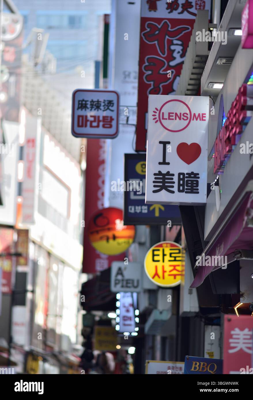 Neon advertisement signs on stores in Myeongdong, famous commercial and ...