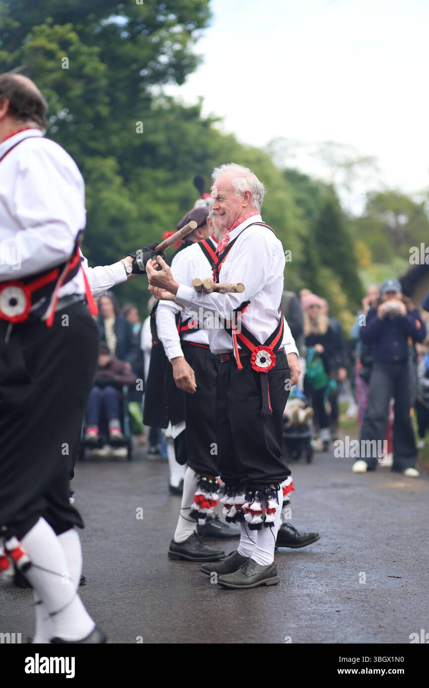 Morris dancers dancing in village street English traditional dance folk ...
