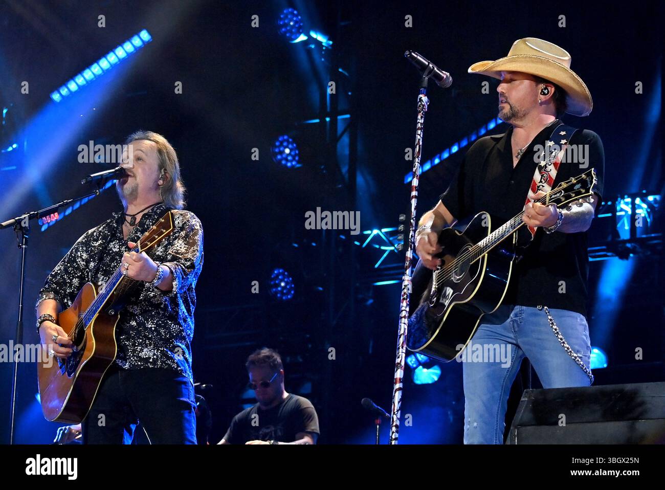 Nashville, USA. 06th June, 2025. Travis Tritt and Jason Aldean onstage ...