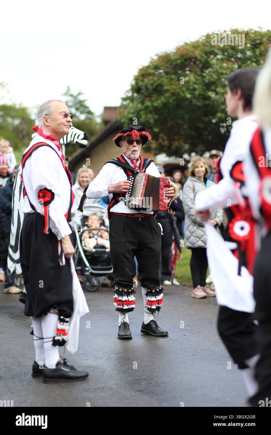 Morris dancers dancing in village street English traditional dance folk ...