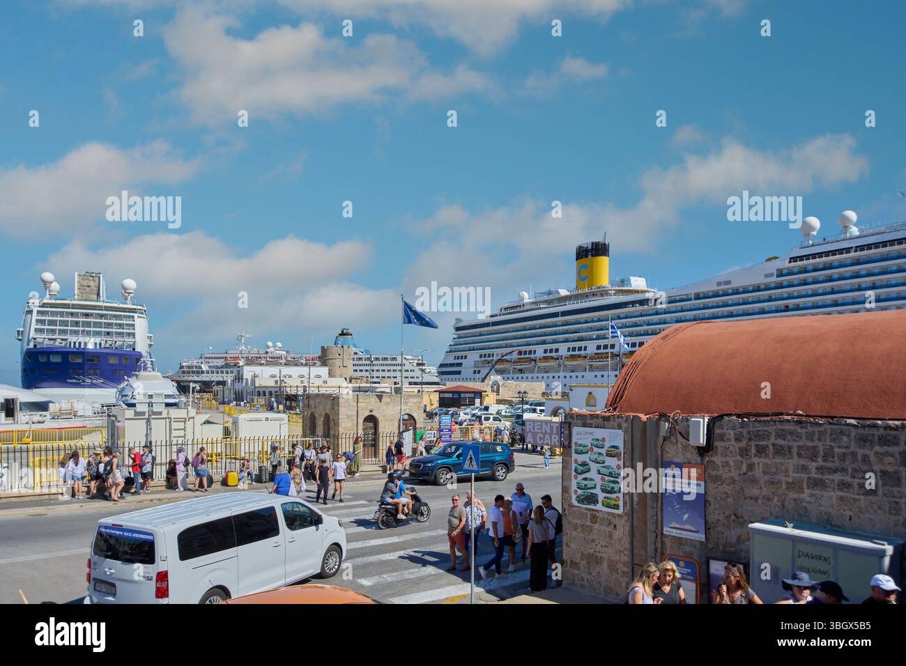Rodas.Greece - june 05, 2025: A busy day at Rhodes port, where imposing ...