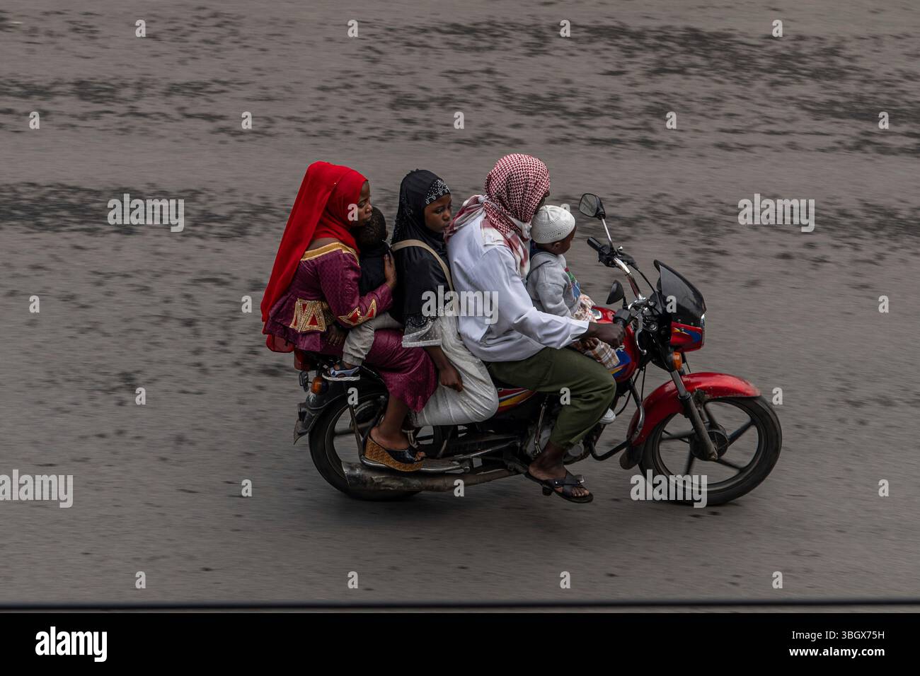 Five persons ride on a motorbike as Muslims gather for Eid al-Adha ...