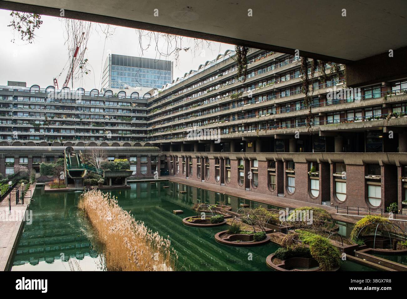 Barbican Estate in London with view over Barbican Water—brutalist ...