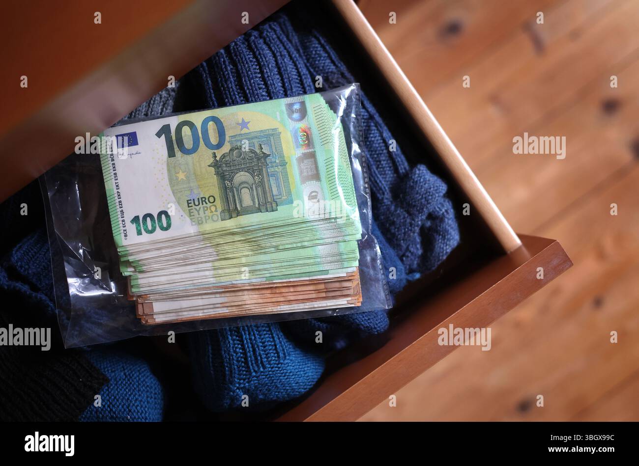 Augsburg, Germany. 03rd June, 2025. Euro banknotes in a transparent ...