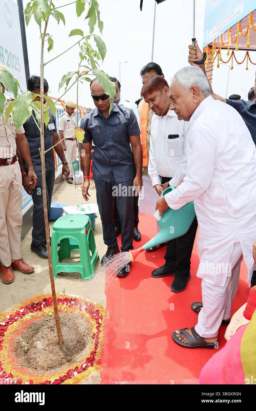 PATNA, INDIA - JUNE 5: Bihar Chief Minister Nitish Kumar planting tree ...