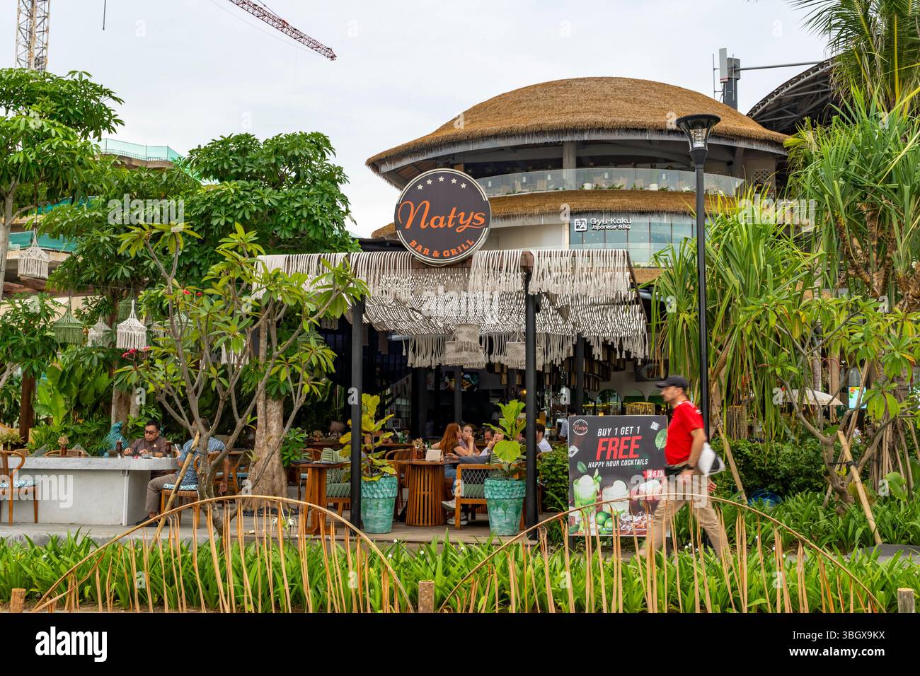 Bali, Indonesia - Dec 17, 2024: Icon Mall Bali. Group of people are ...